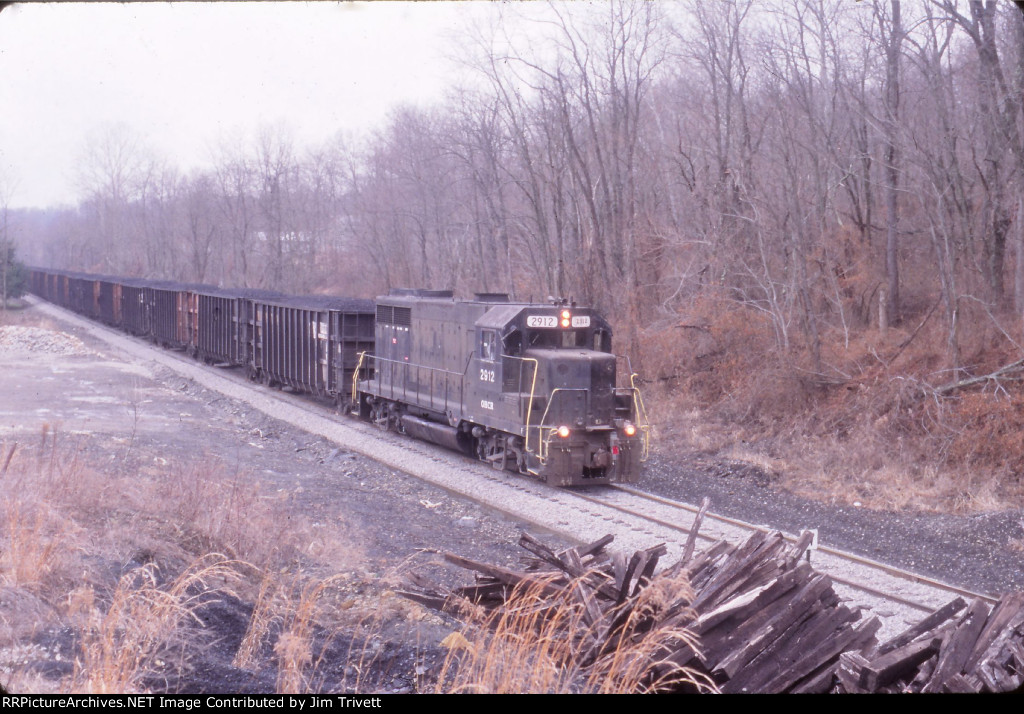 OHCR 2912 pulls past the old loadout at McLuney